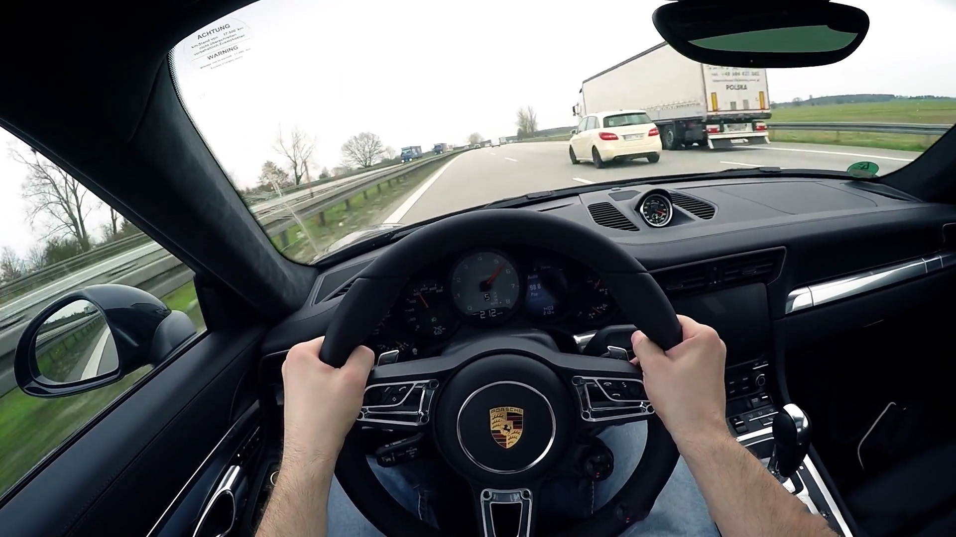 Driving Porsche 911 C4S turbo acceleration on the Autobahn