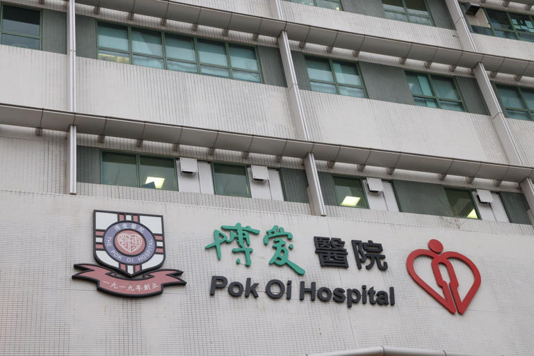 Hong Kong woman dies after taxi overturns in crash