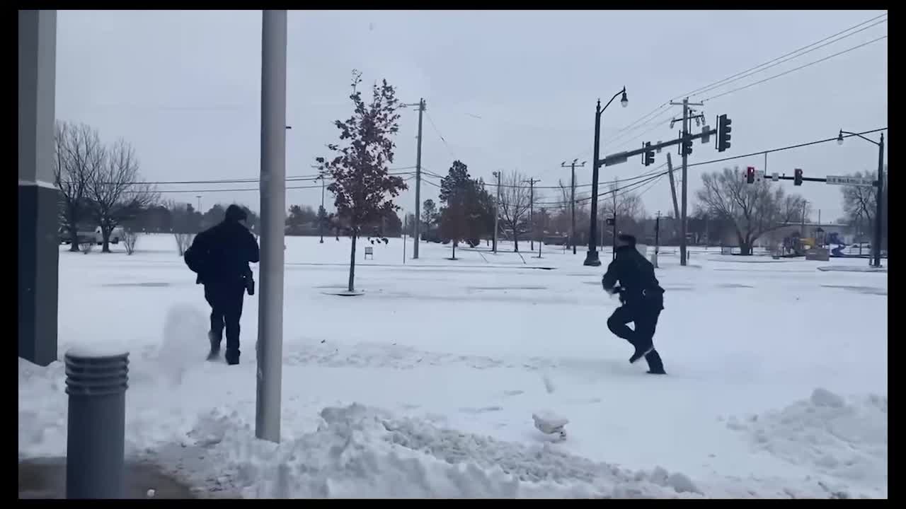 Warr Acres rookies take brief break for snowball fun