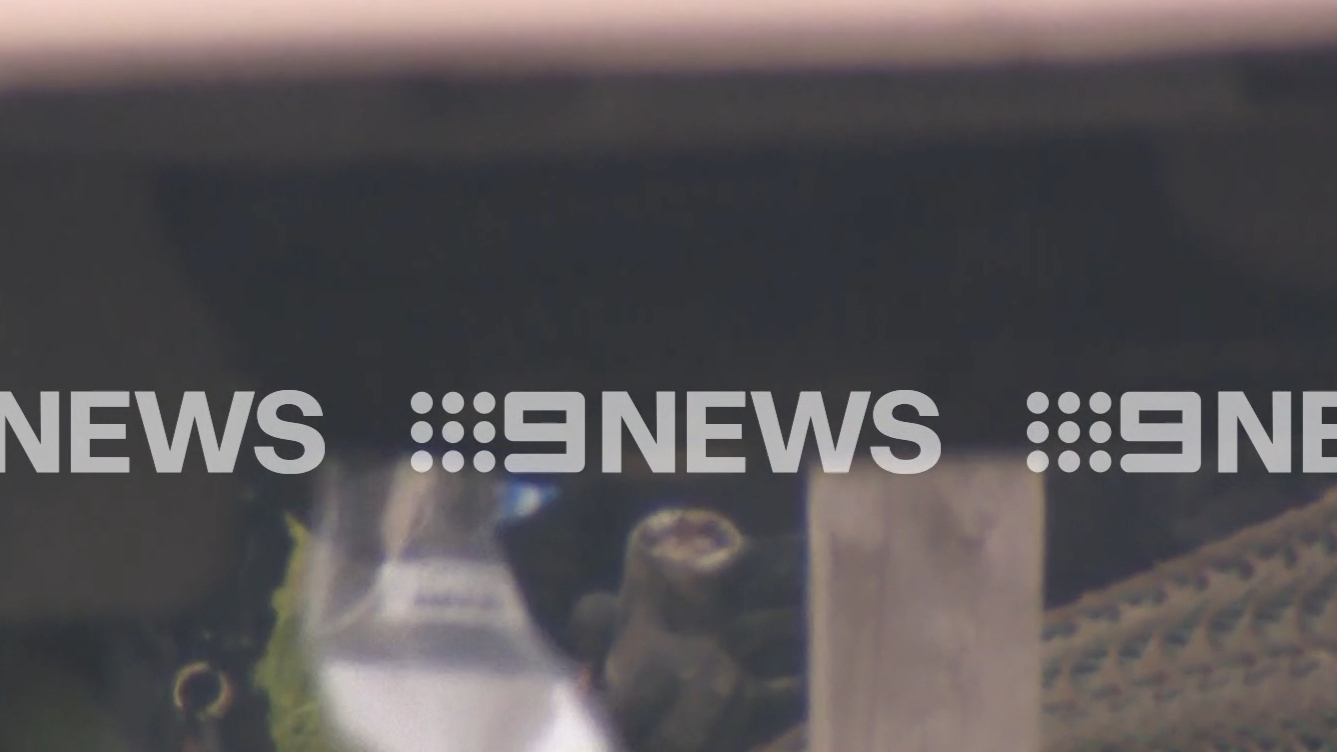 Police swarm Melbourne property after suspicious devices found