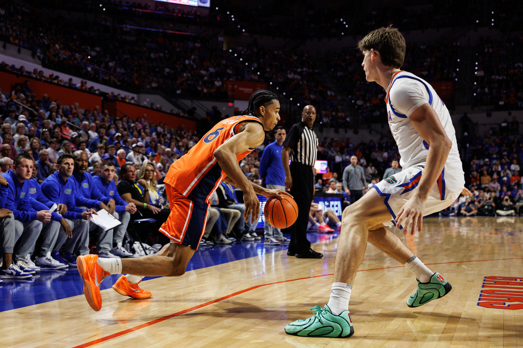 Hall has 24 points as Auburn beats No. 16 Florida 76-67 for first win ...