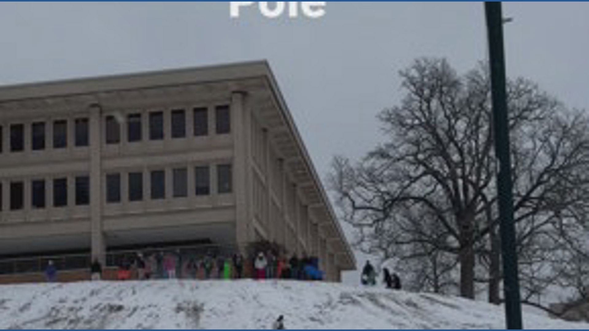 U of A sledder slides into pole!