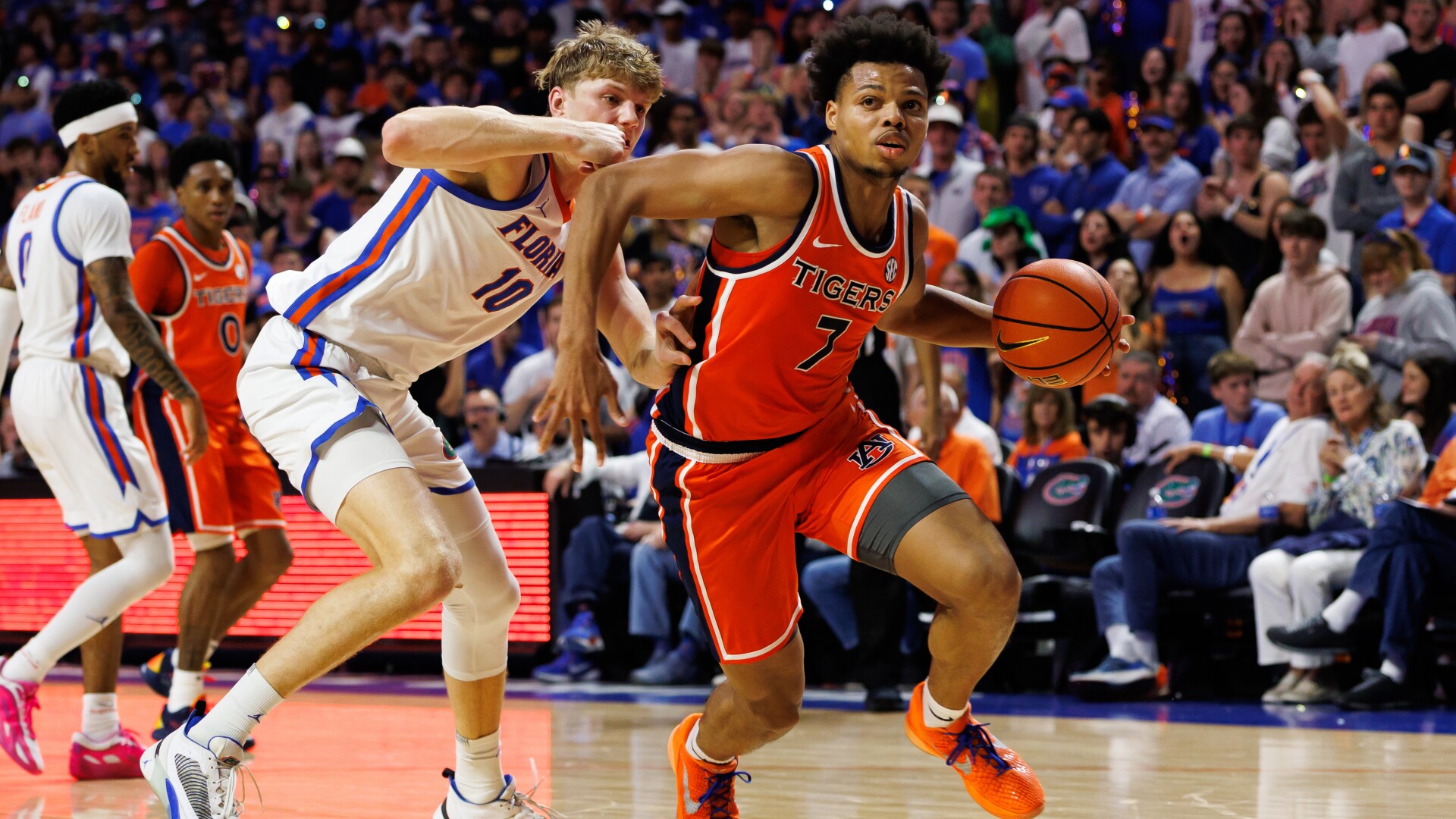 Hall has 24 points as Auburn beats No. 16 Florida 76-67 for first win ...