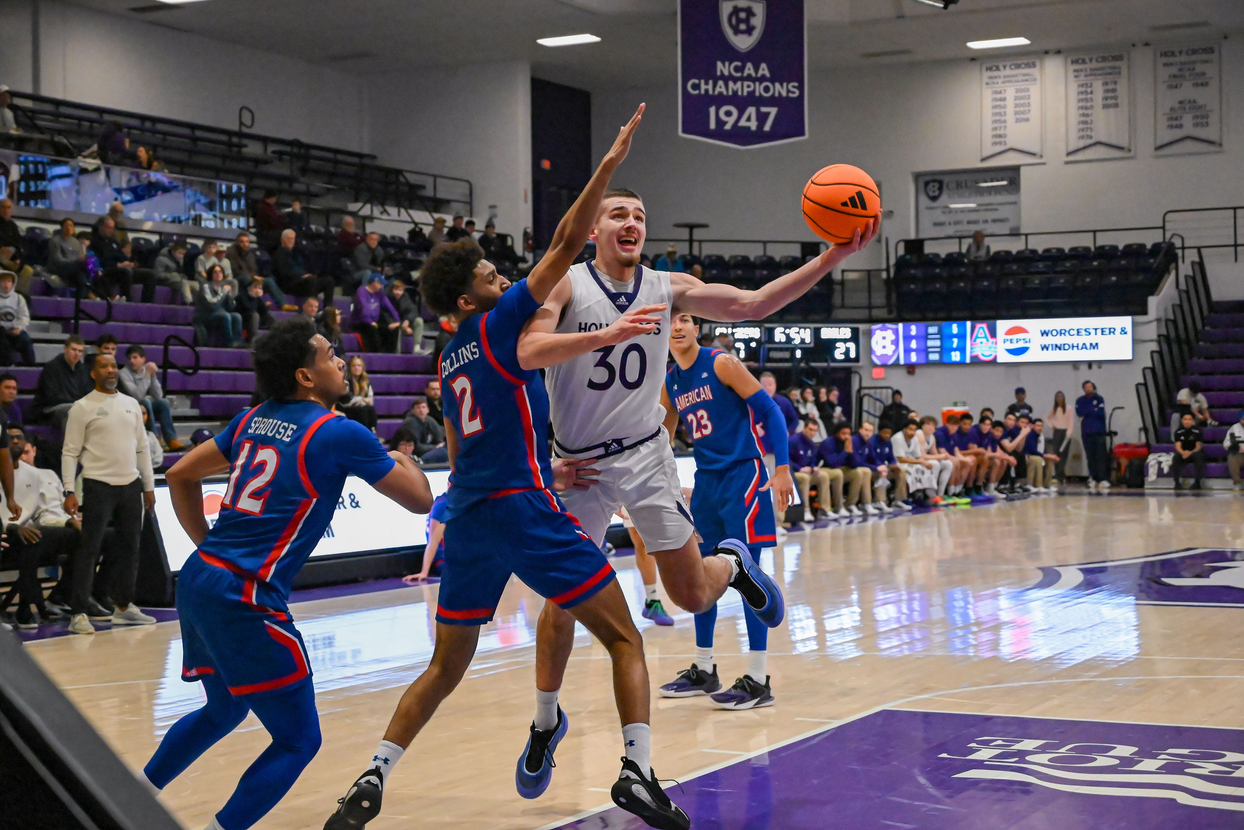 'We dug ourselves a hole early': Holy Cross can't keep up with American