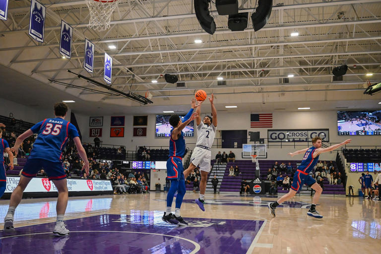 'We dug ourselves a hole early': Holy Cross can't keep up with American