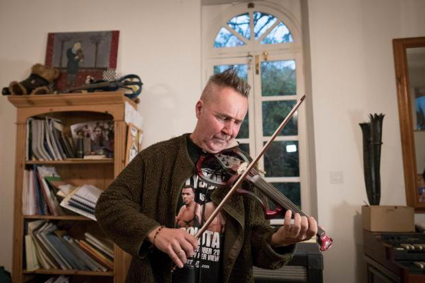 Record-selling violinist postpones City Hall show to recover from ...