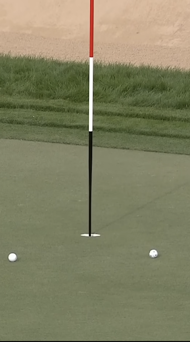 Rory McIlroy vs. Tommy Fleetwood on the 14th at Emirates Golf Club