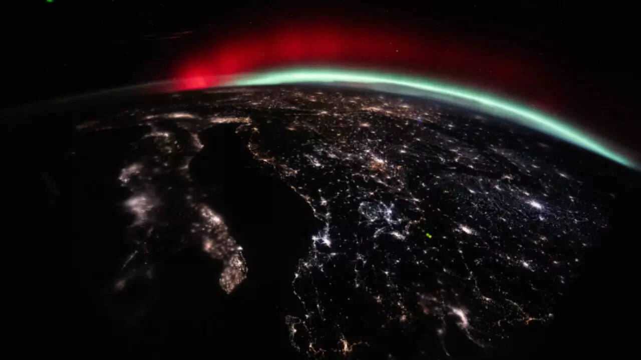 NASA captures a rare red and green aurora over Europe from the ...