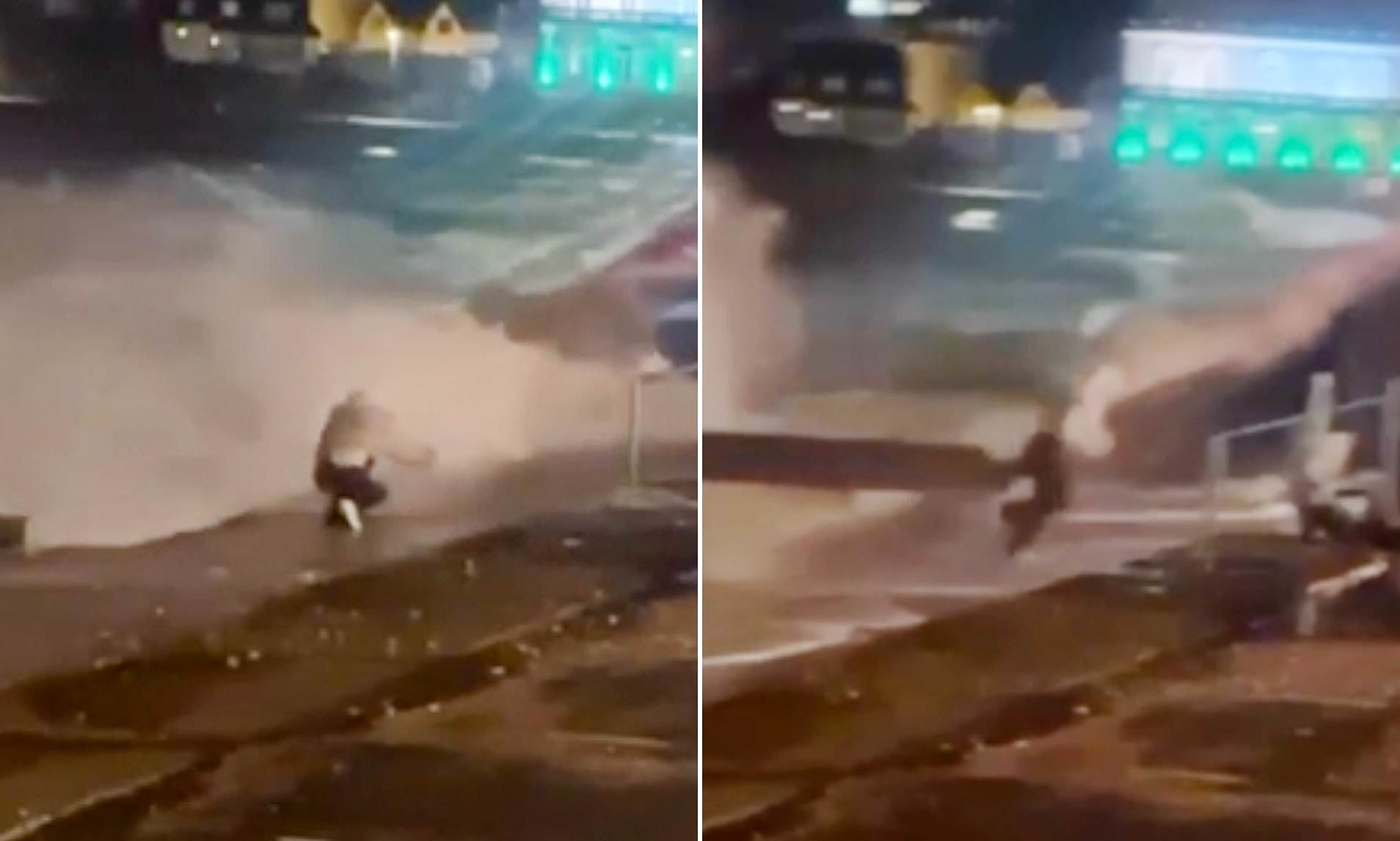 Moment girl is nearly swept out to sea taking a selfie on a harbour ...