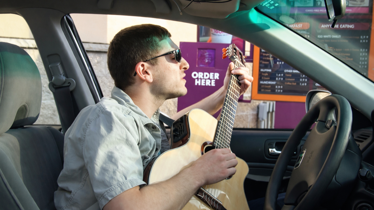 Ordering at the drive-thru by singing with a guitar