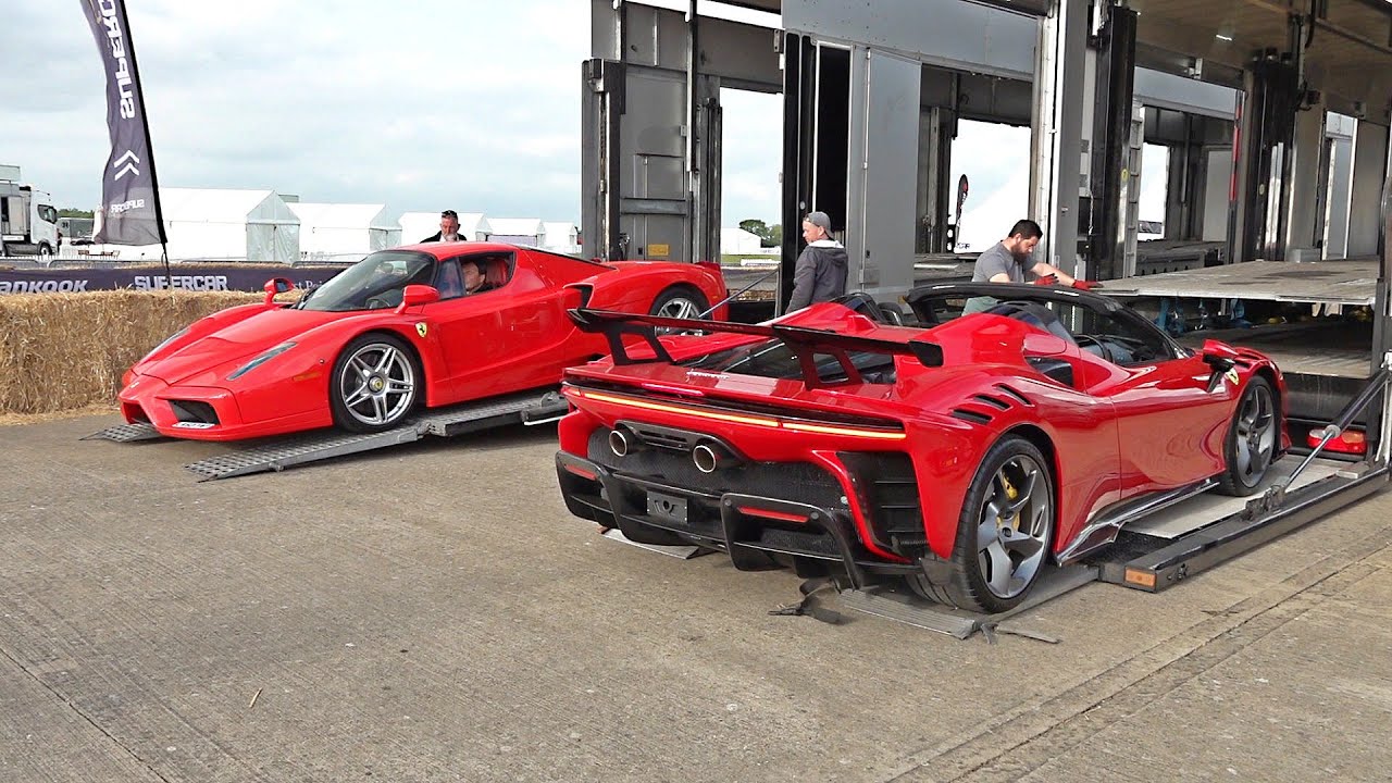 Luxury hypercars being moved onto carrier truck