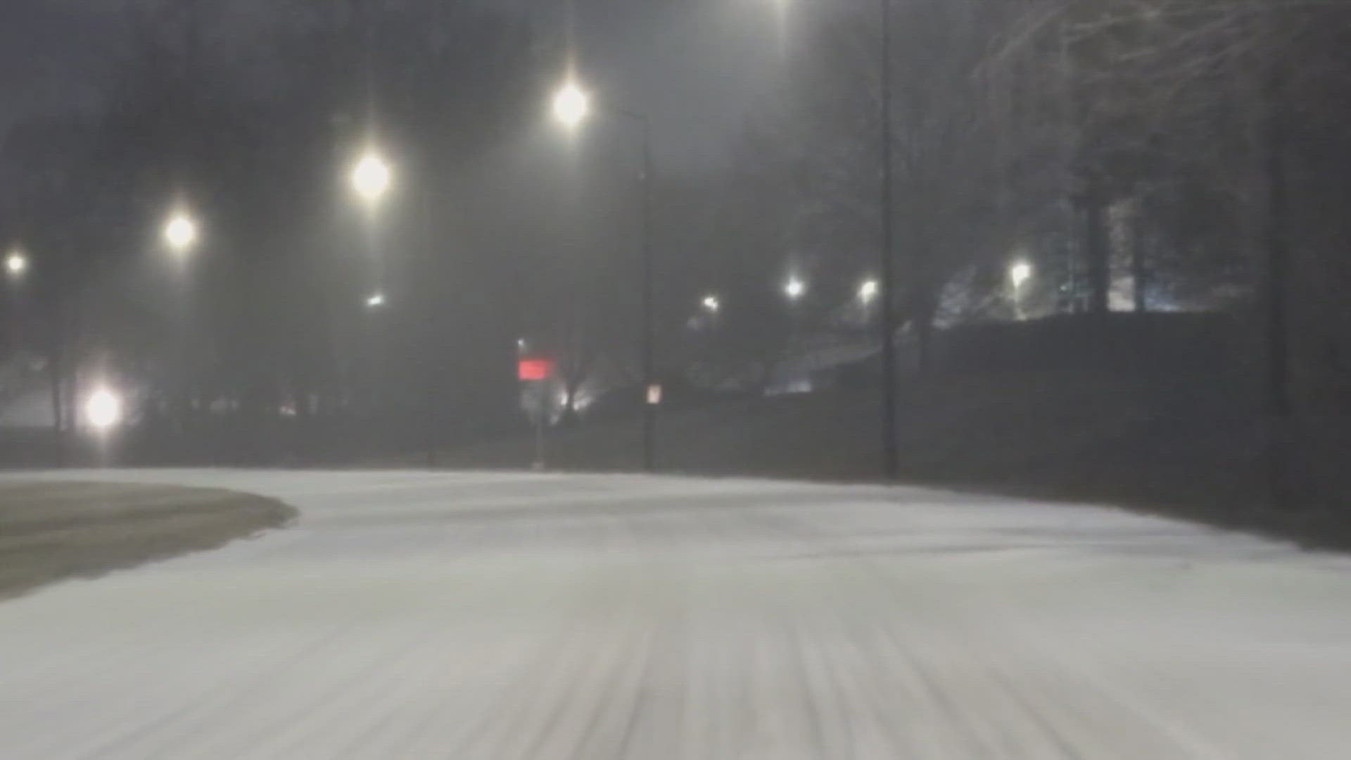 Watch: Ice covers the road along Tryon Street