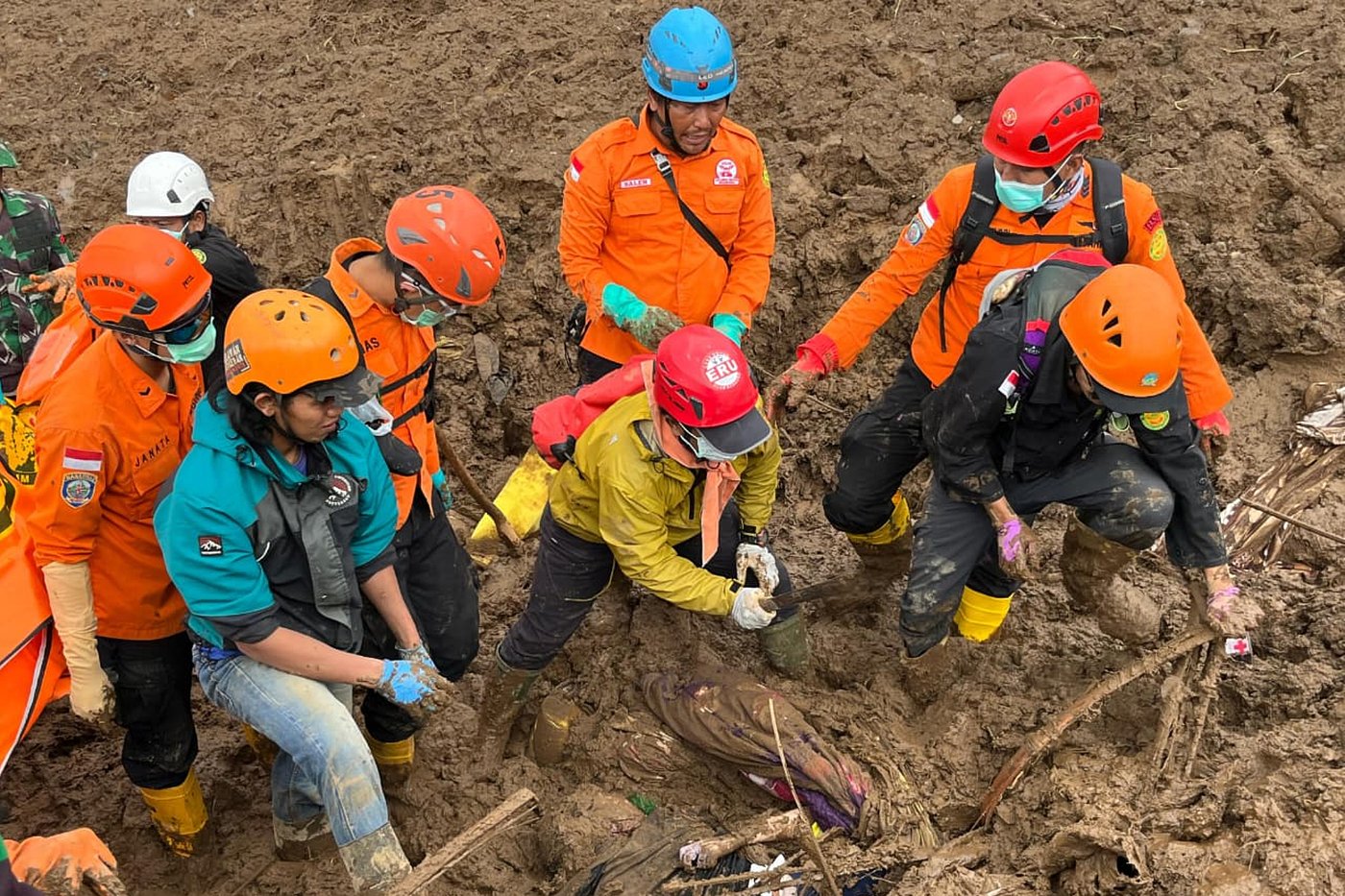 Rescuers recover more bodies from landslide in Indonesia, with 72 still ...