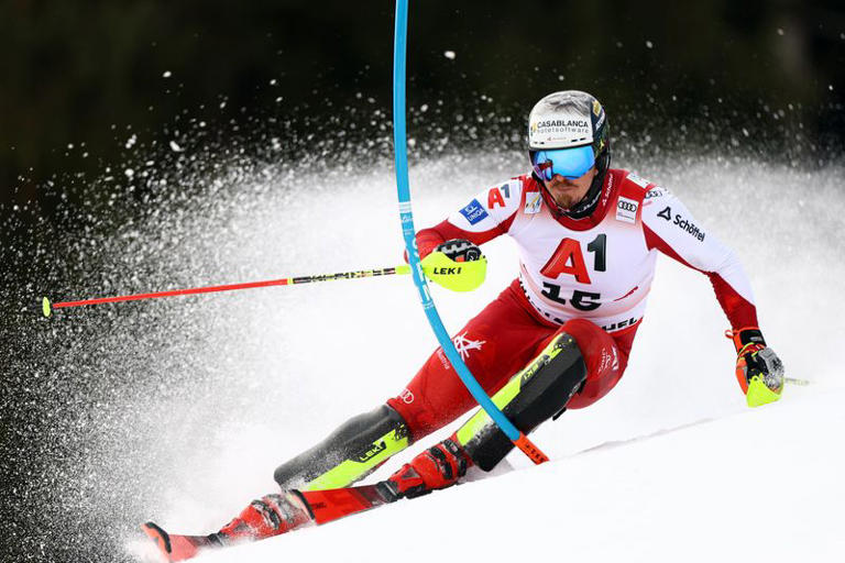 Alpine skiing-Feller a winner on home snow in Kitzbuehel slalom