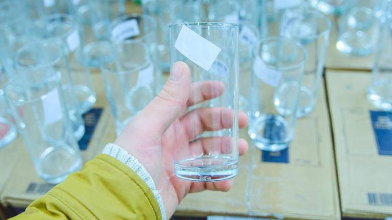 Remove price tag stickers from glass with an easy tape hack