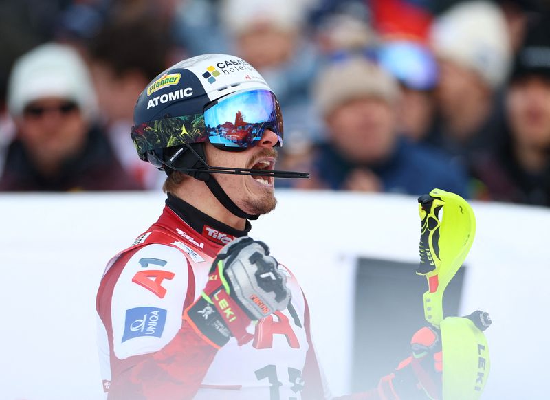 Alpine skiing-Feller a winner on home snow in Kitzbuehel slalom