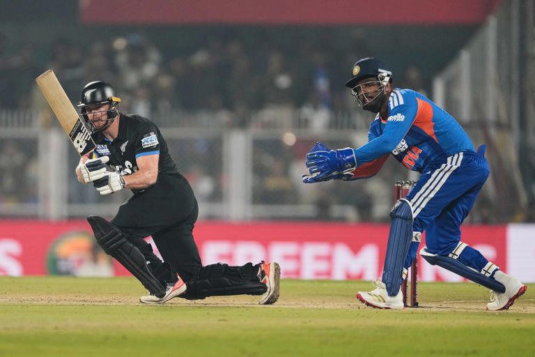 Sharma hits 14-ball 50 as India beats NZ with 10 overs to spare and ...