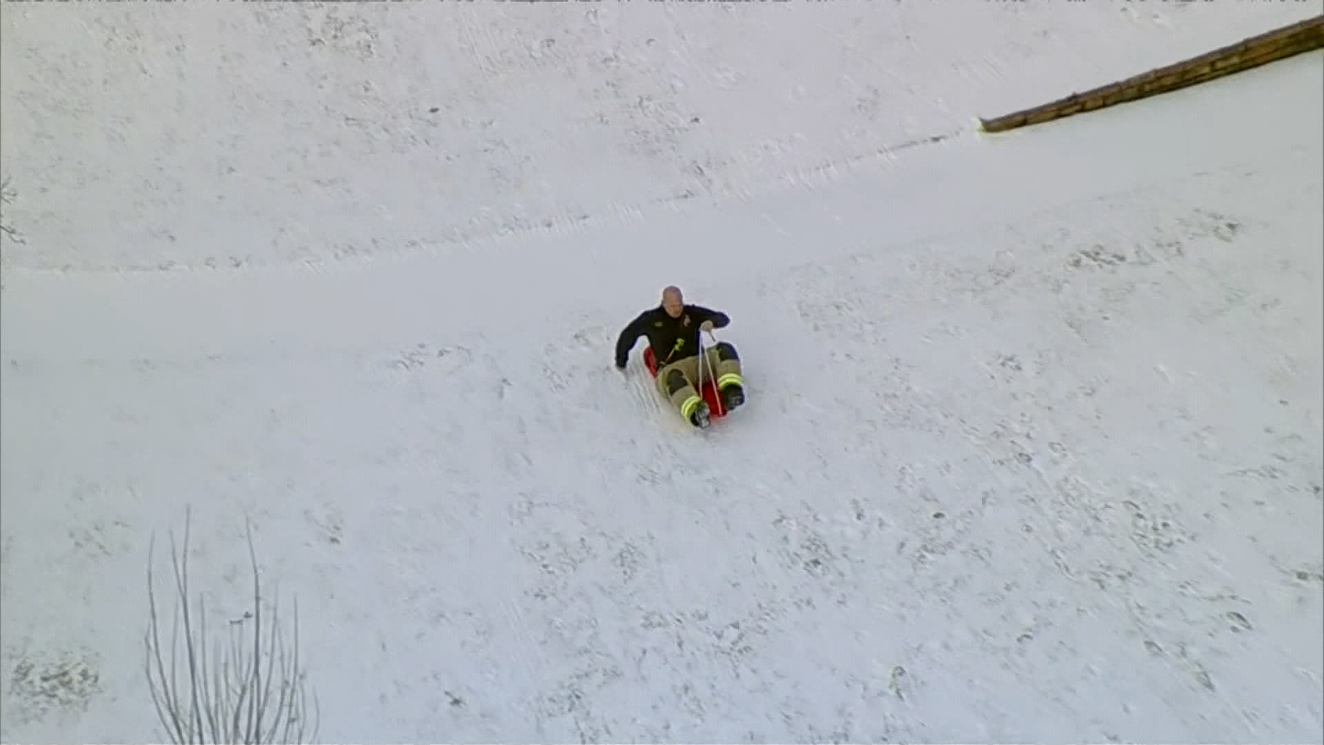 North Texas firefighter goes sledding in the snow