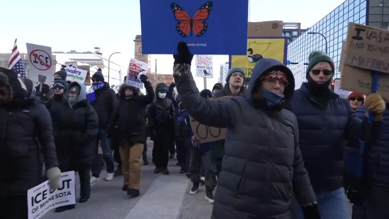 Anti-ICE protesters march through Minneapolis after Border Patrol ...