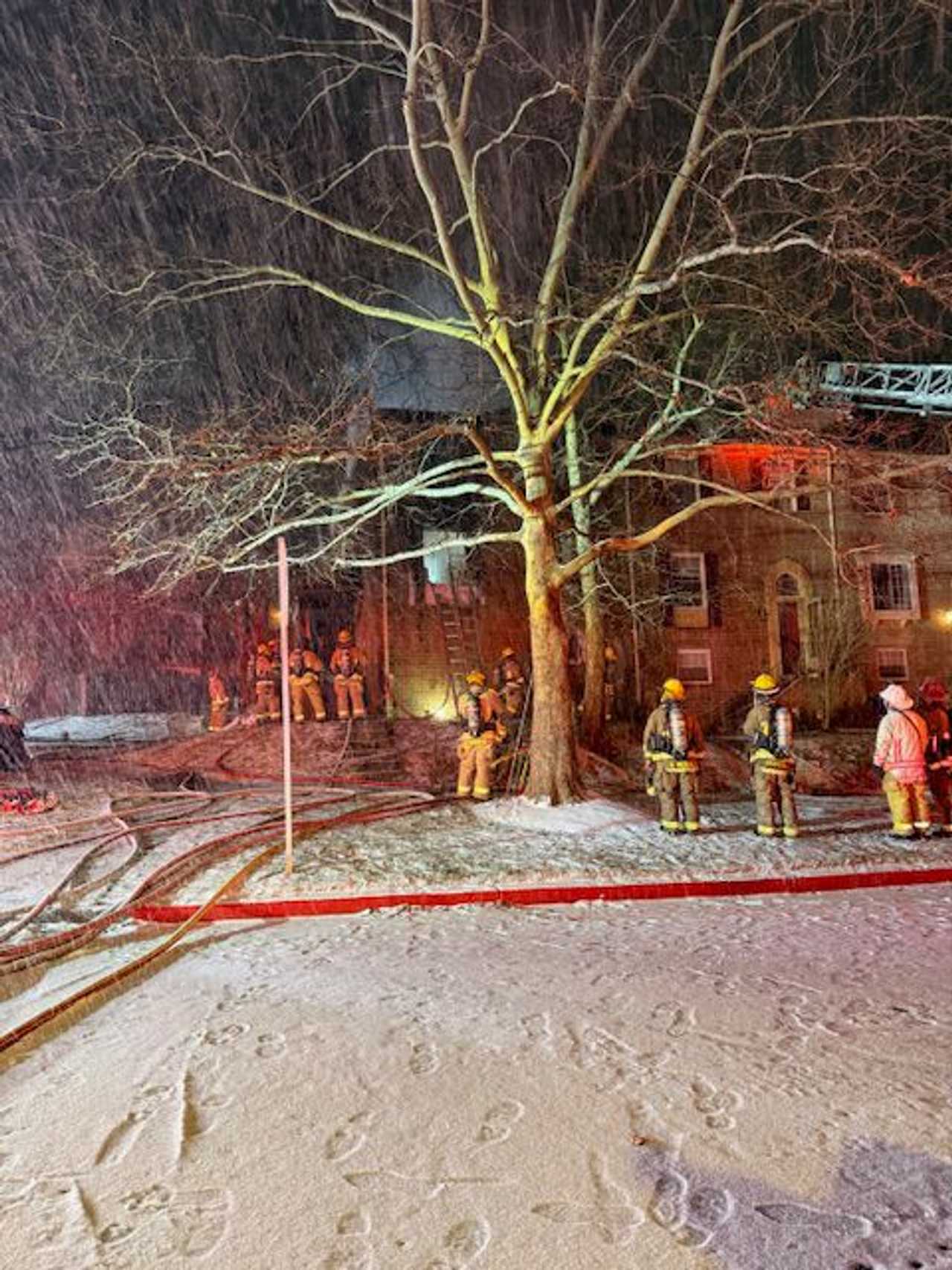 Snow outside, flames inside: Middle-of-the-night townhouse fire forces ...