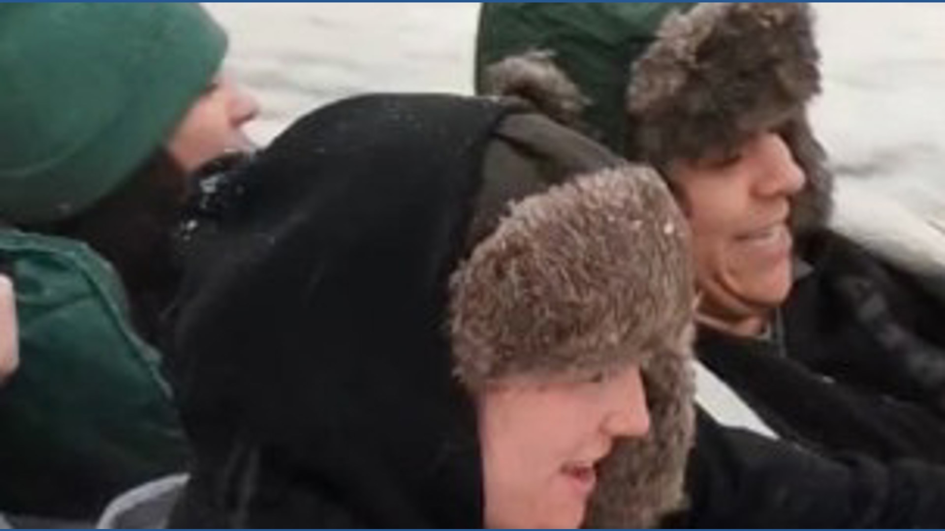 Students at Ohio University enjoy sledding as snow continues