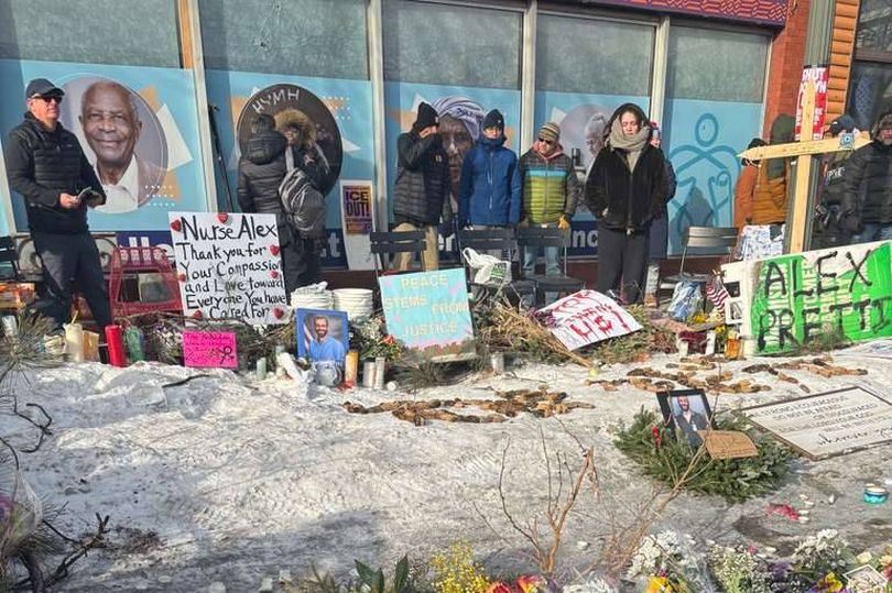 Heartbroken Minneapolis mourns Alex Pretti at roadside memorial asking ...