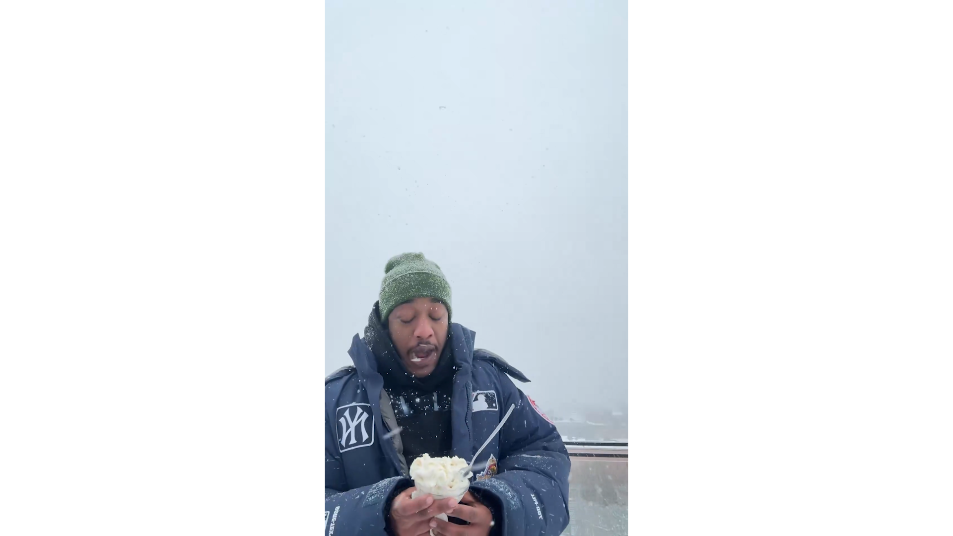 Man makes vanilla ice cream outside in the middle of snow storm