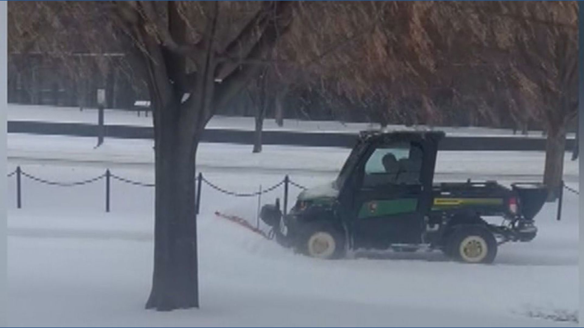 Snow plow struggles in the snow in Washington DC