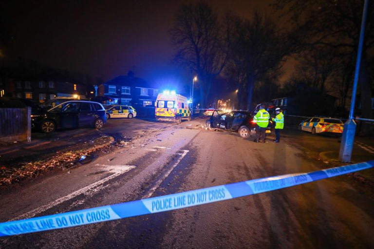 Two people taken to hospital after car ploughs into garden in crash