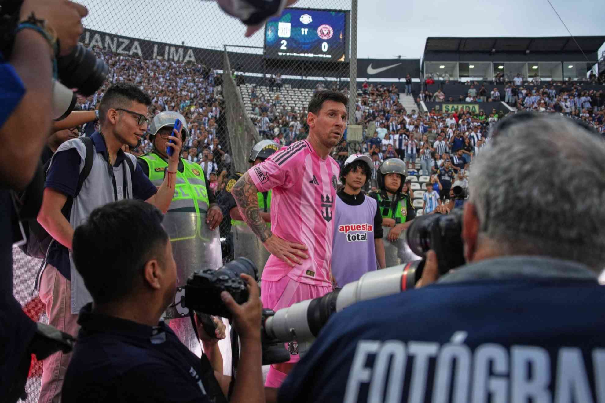 Lionel Messi reacts as a photographer crosses the line during an Inter ...
