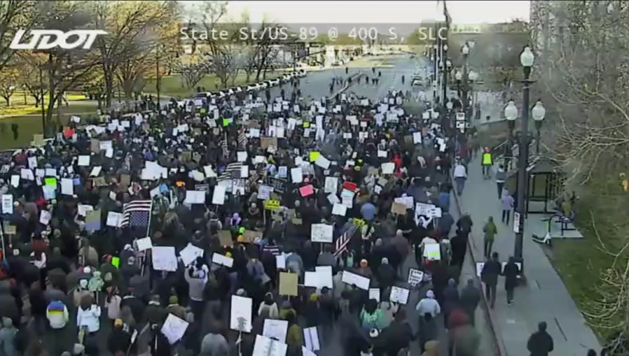 Watch: People march in Salt Lake City to protest ICE after man was ...