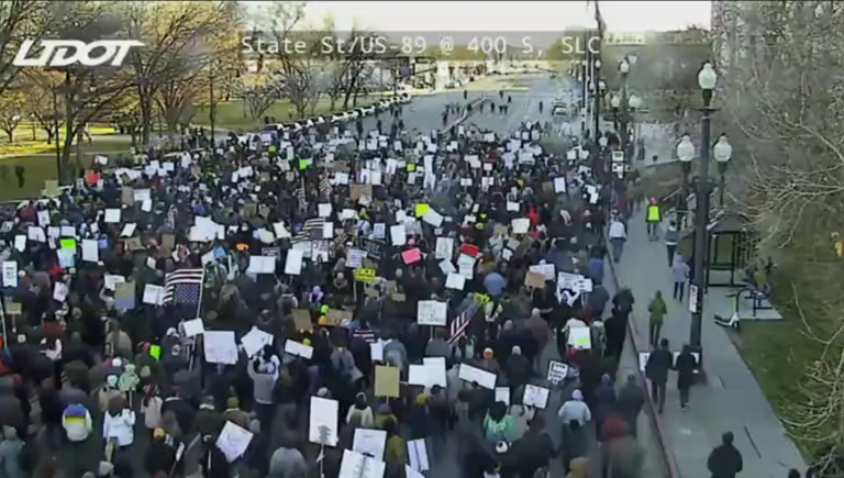 Watch: People march in Salt Lake City to protest ICE after man was ...