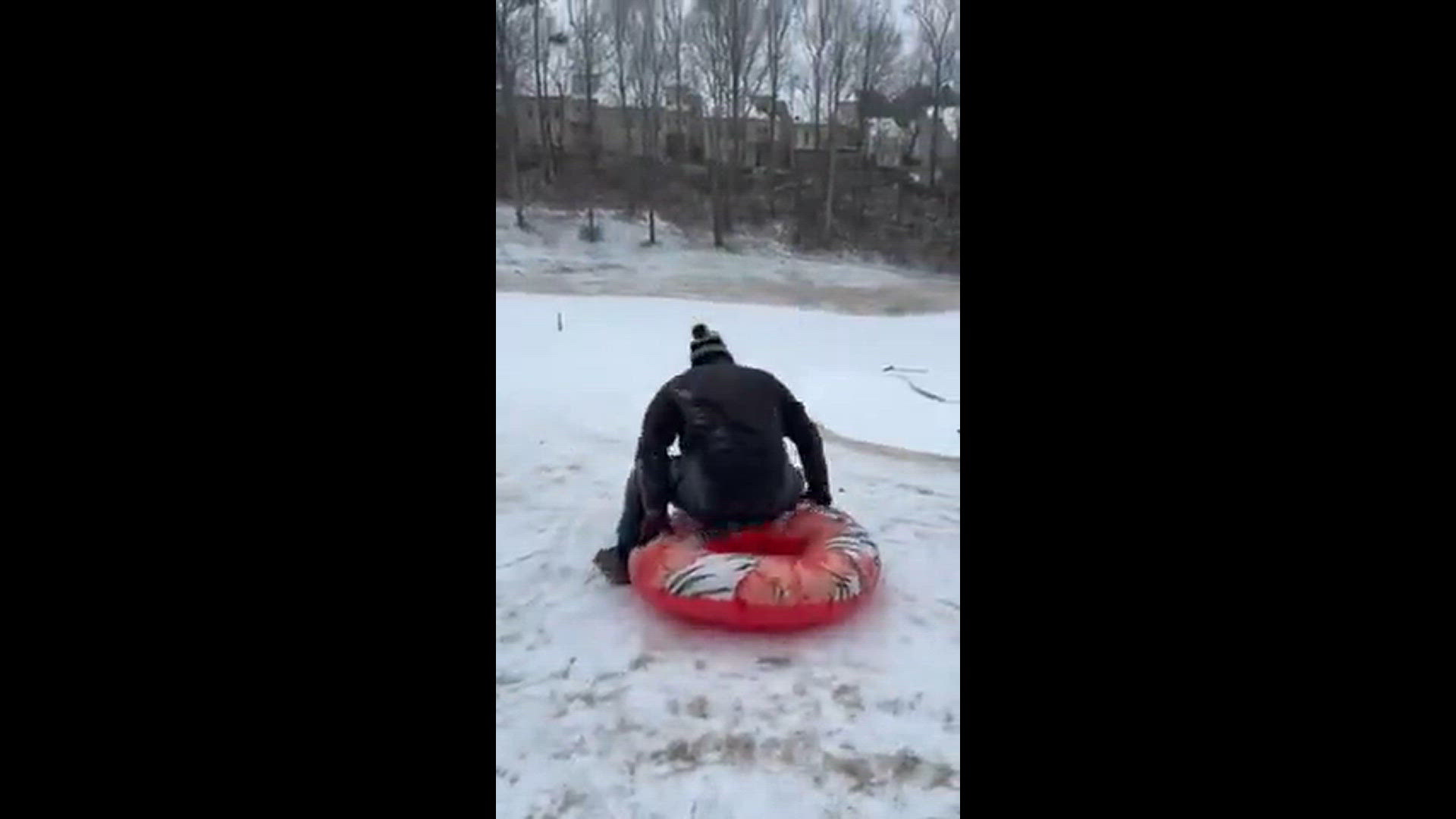 Sledding fun on golf course