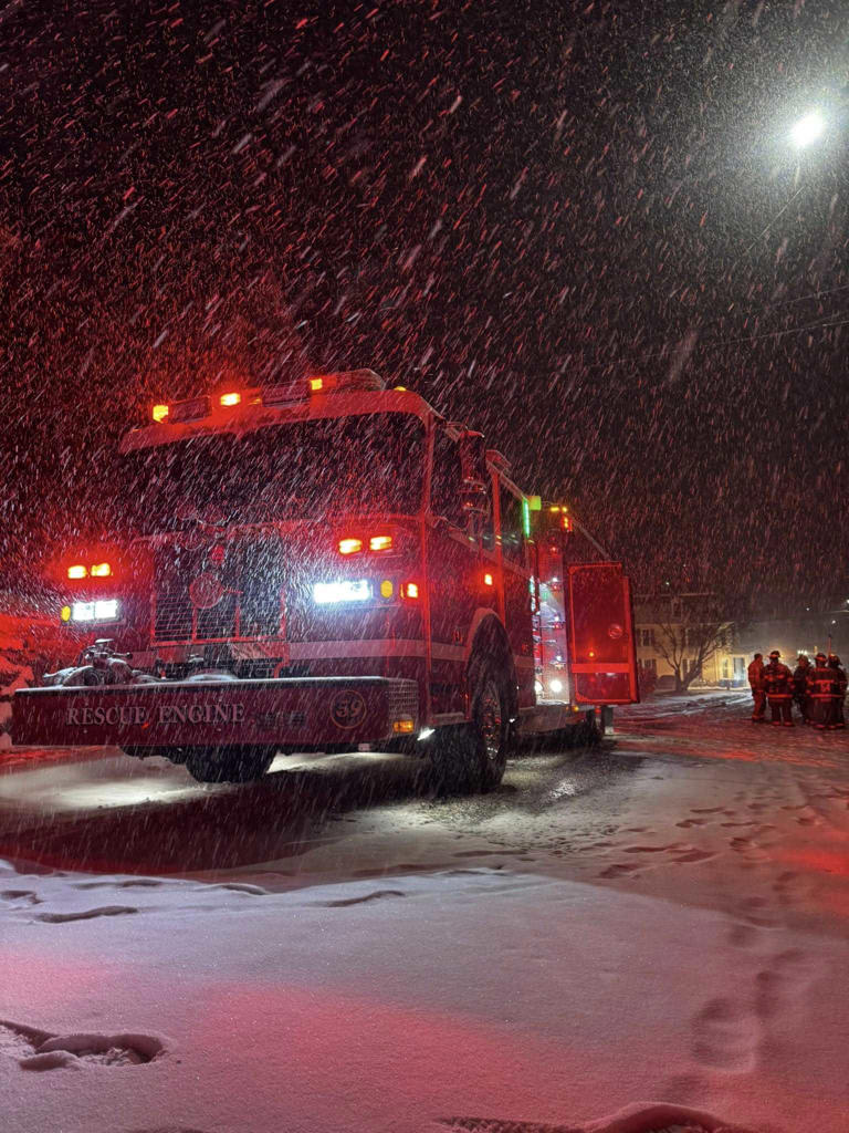 Fire destroys barn during snowstorm; 1 person injured