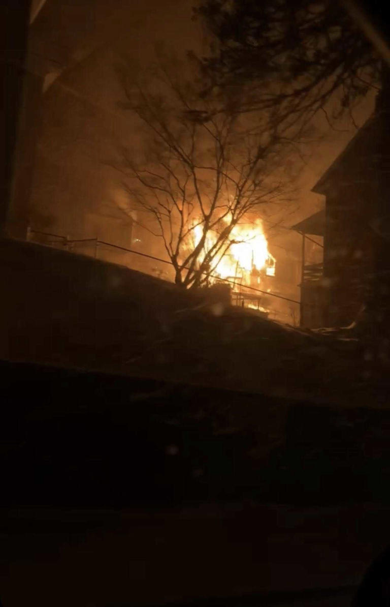 Fire destroys barn during snowstorm; 1 person injured