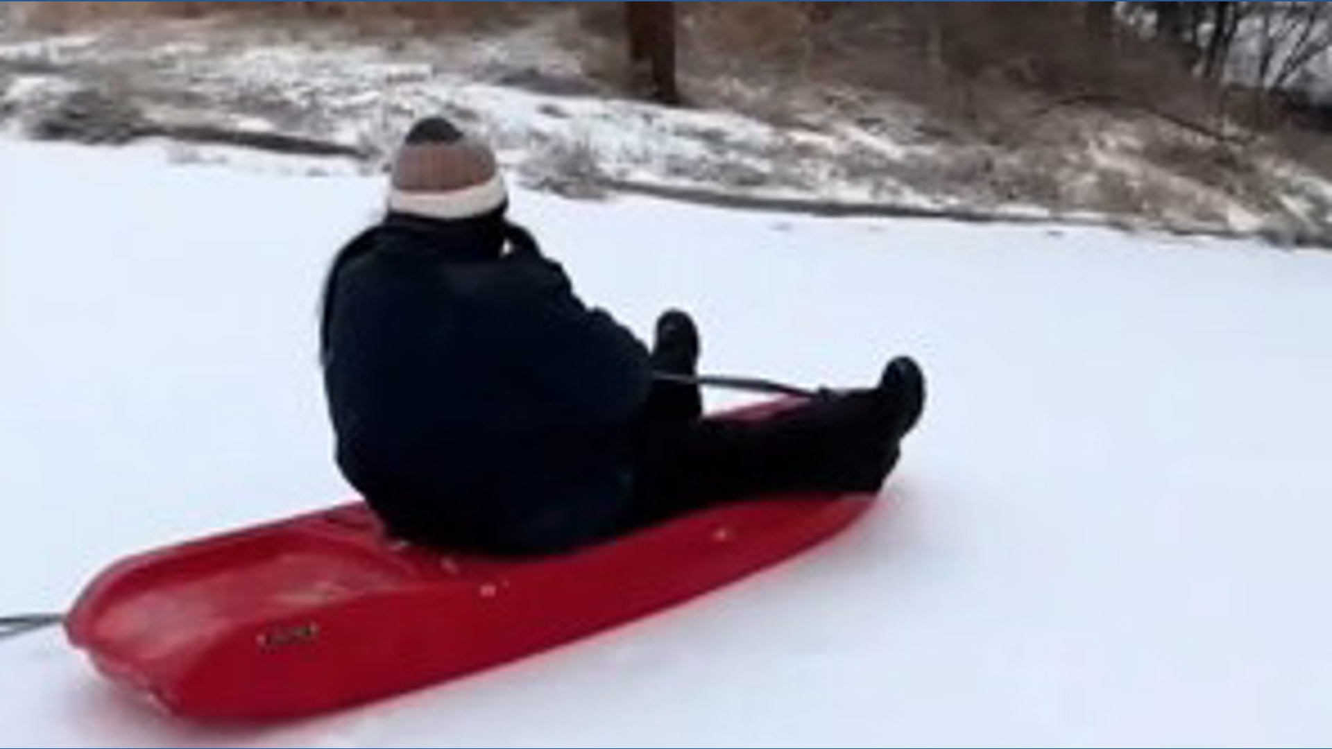 Arkansans embrace winter weather with sledding fun