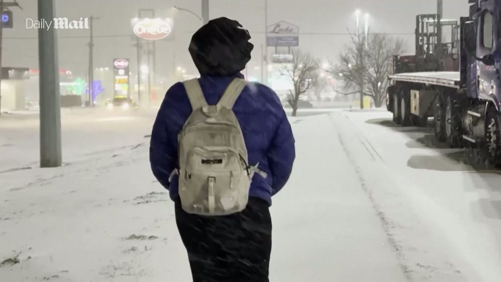 Winter storm batters Oklahoma and Arkansas as snow covers roads