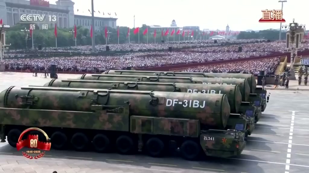 China unveils new weaponry at massive military parade