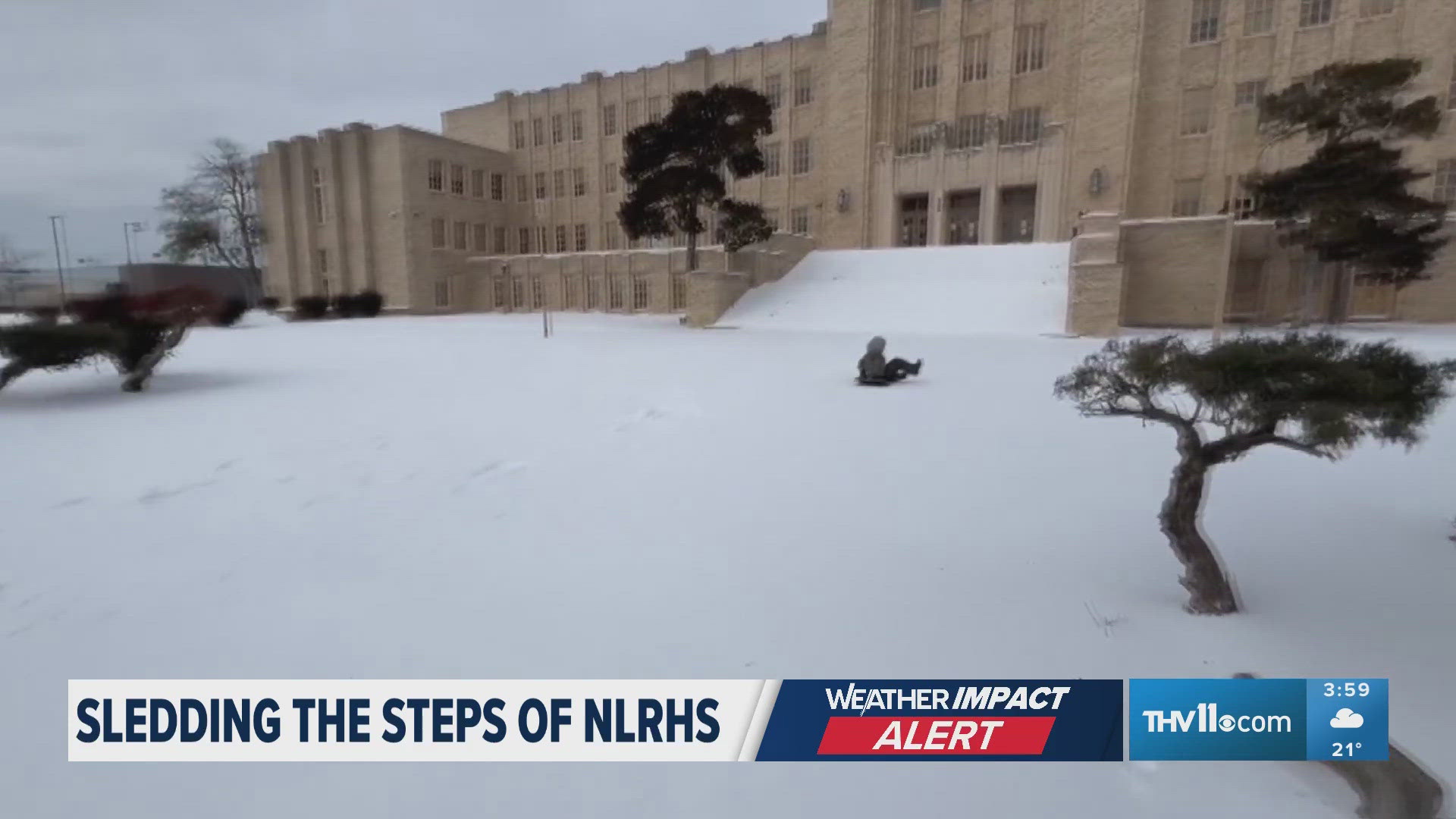 Sledding on the steps of North Little Rock High School