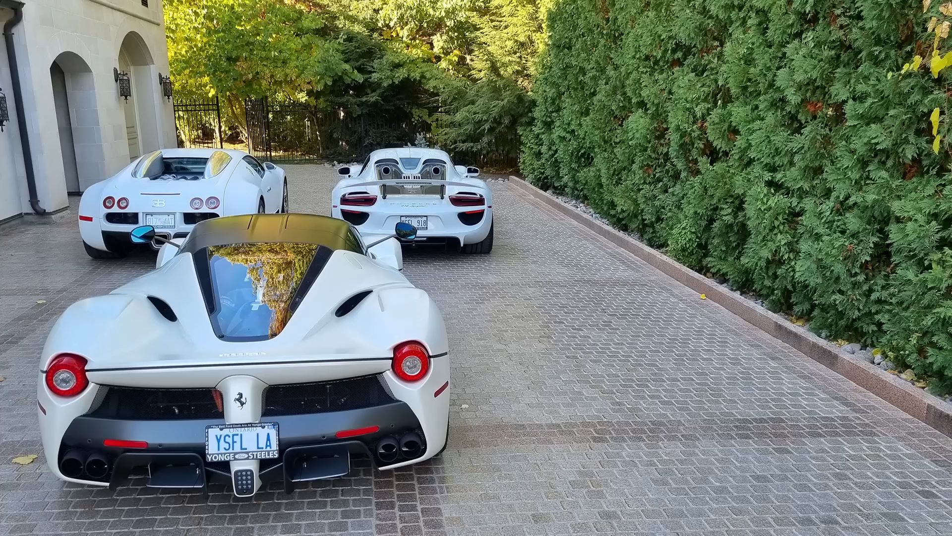 Hypercar trio at a private mansion