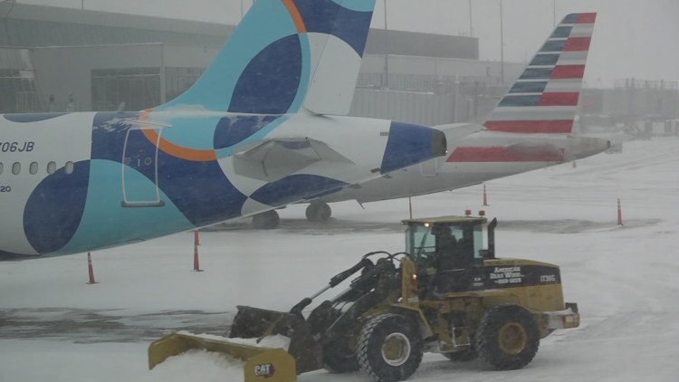 Buffalo airport limits operations Sunday as winter storm cancels most ...