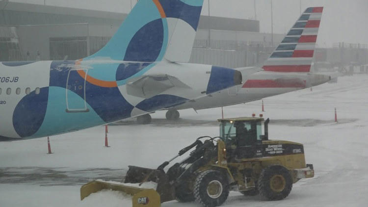 Buffalo airport limits operations Sunday as winter storm cancels most ...