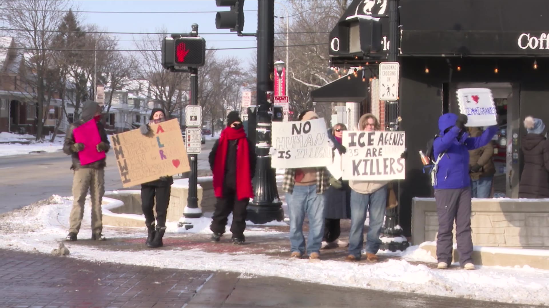 Peoria residents protest federal immigration enforcement, calling for ...