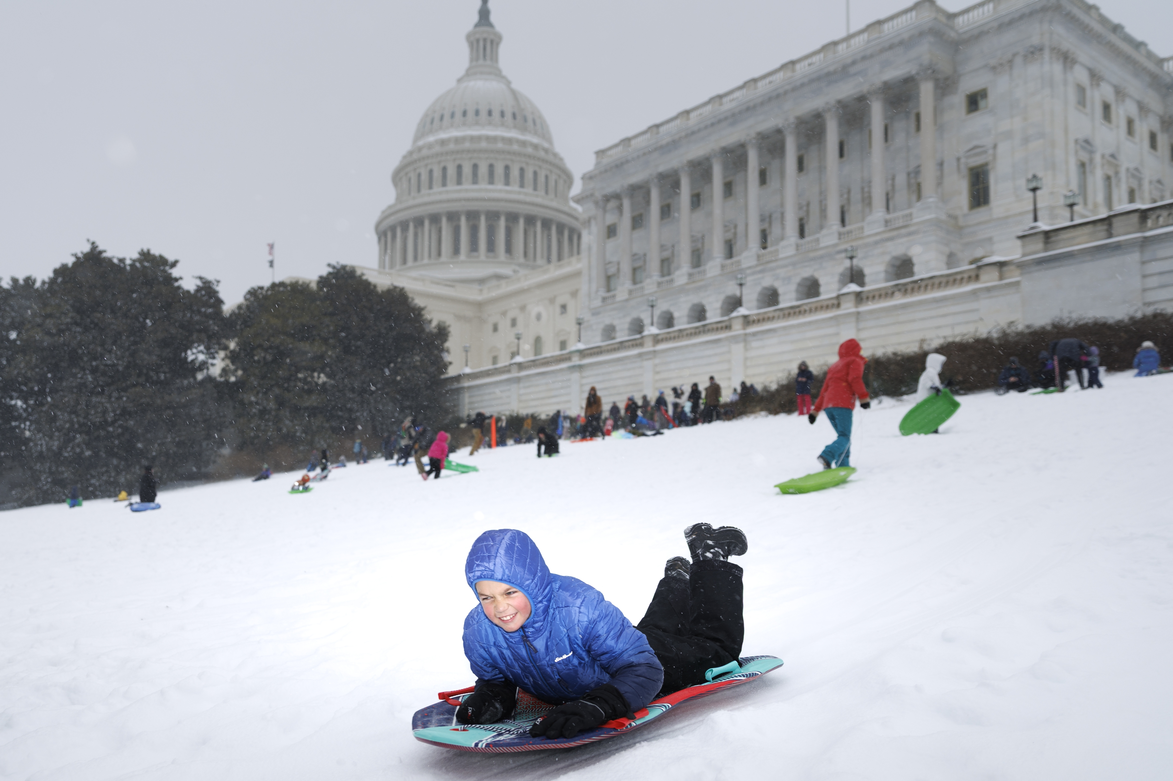 Sleet, freezing rain disrupt life in Washington after snowy morning