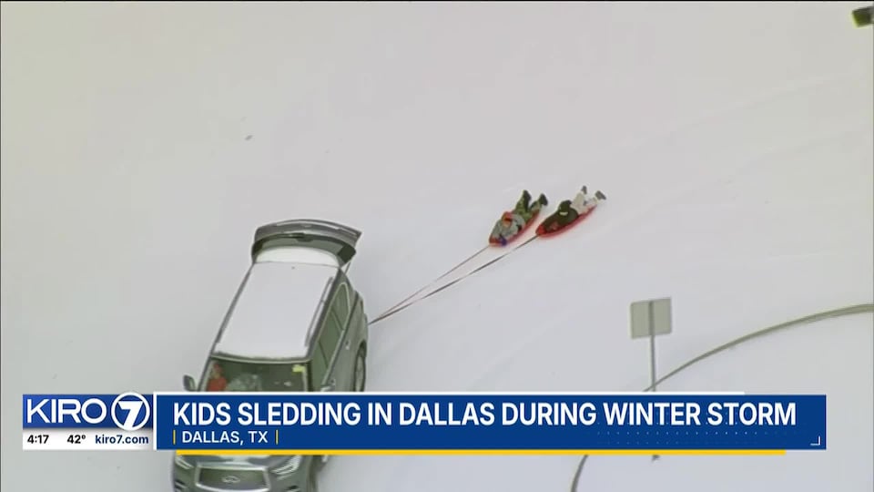 Video: Kids sledding behind car in Dallas during winter storm