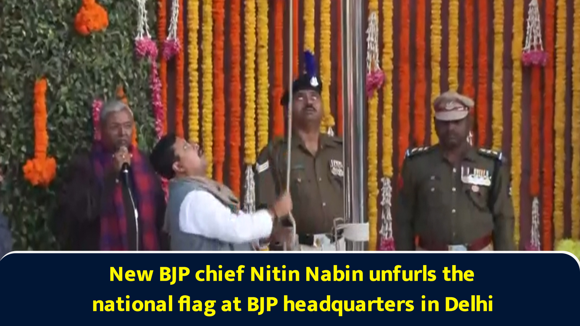 New BJP chief Nitin Nabin unfurls the national flag at BJP headquarters ...