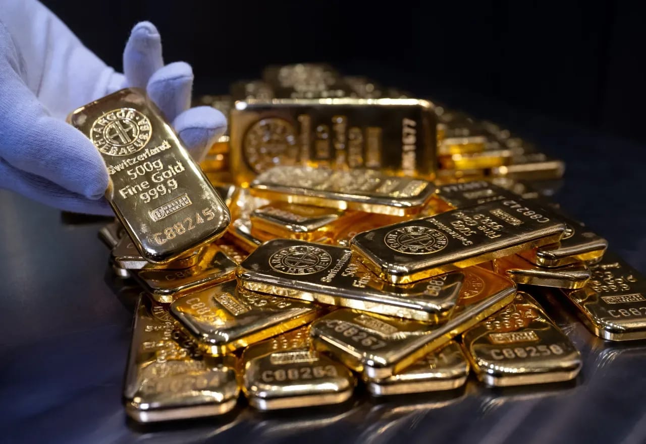 Gold futures smash $5,000, silver blows past $100 as Trump risks ignite ...