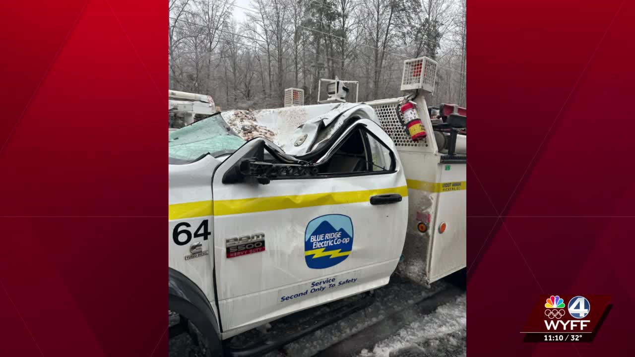 Two linemen escape unharmed after tree falls on truck during ice storm