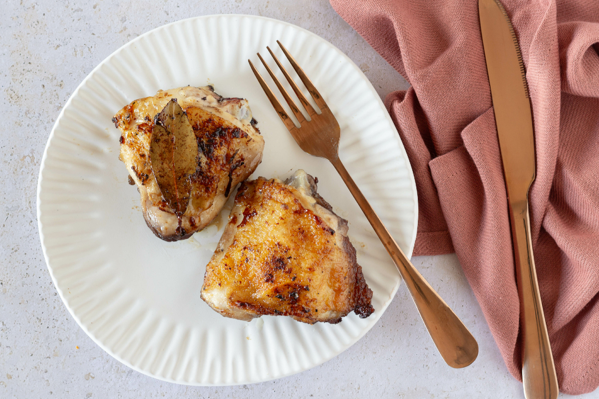 Chicken thighs in a pan