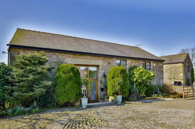 Barn with arched 18th-century door and views of Pendle Hill on the ...